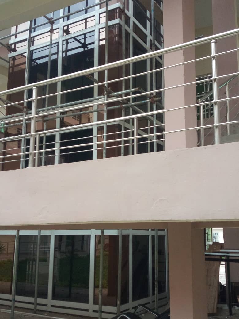 Elevator Cover at National Open University – Classical Aluminium